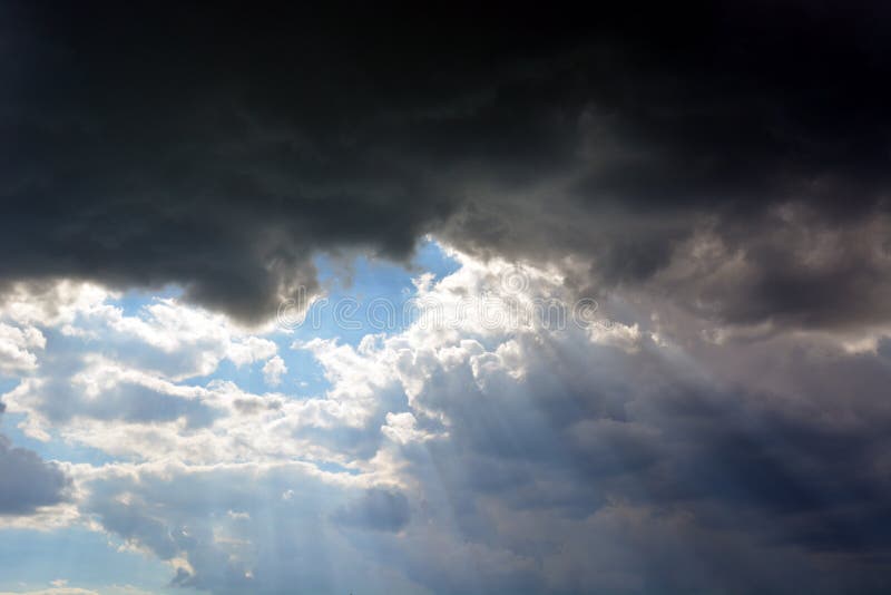 Dark Sky with Sun Rays through the Clouds, Black Blue and White Stock ...