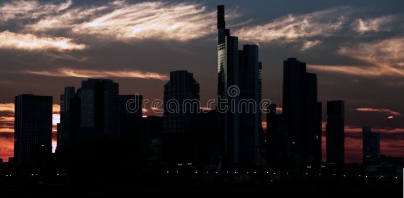 Dark Skyline of a Big City with Skyscrapers in Front of a Dramatic Sky ...