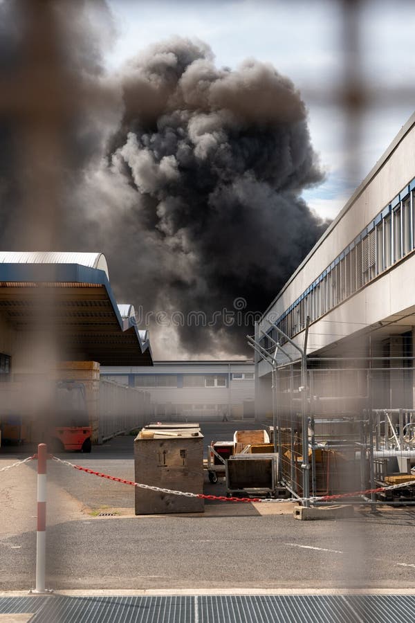 Dark Smoke in the Sky in Daylight from the Factory Fire Stock Photo ...