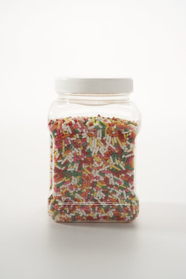 Dark sprinkles jar stock photo. Image of cook, candy, green - 4686422