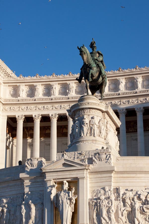 Dark Statue and White Building Stock Image - Image of marble, rome ...