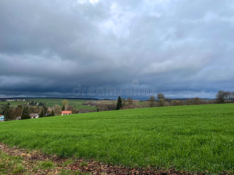 Dark Storm Clouds Gather Over a Village Stock Photo - Image of house ...