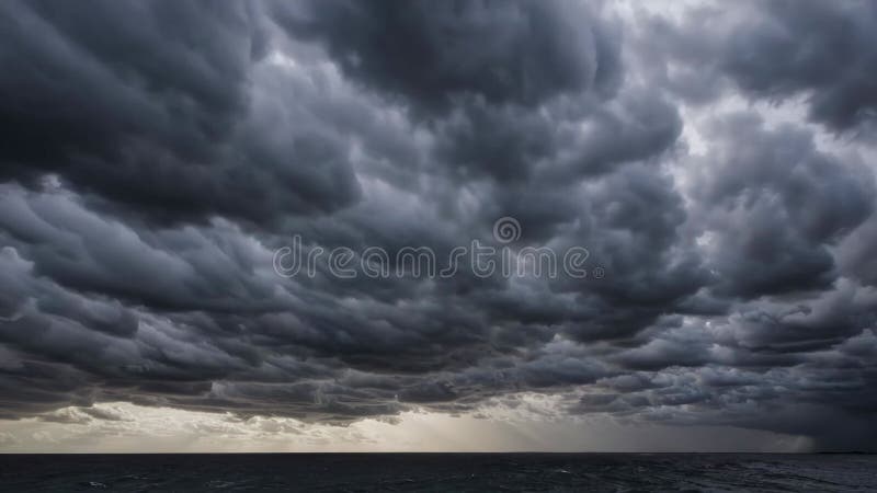 Dark Storm Clouds Over the Ocean with Dramatic Lighting, Tranquility ...