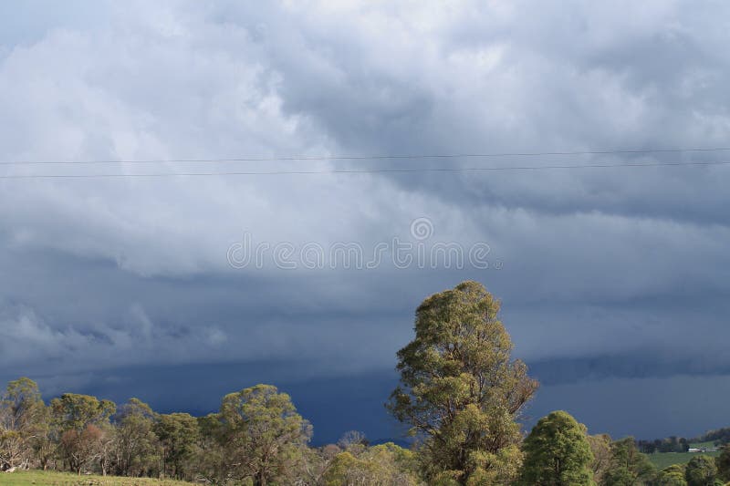 Dark Stormy Clouds Above Treeline Stock Photo - Image of treeline ...