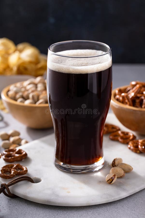 Dark Stout Beer in a Tall Glass on the Table Stock Image - Image of ...