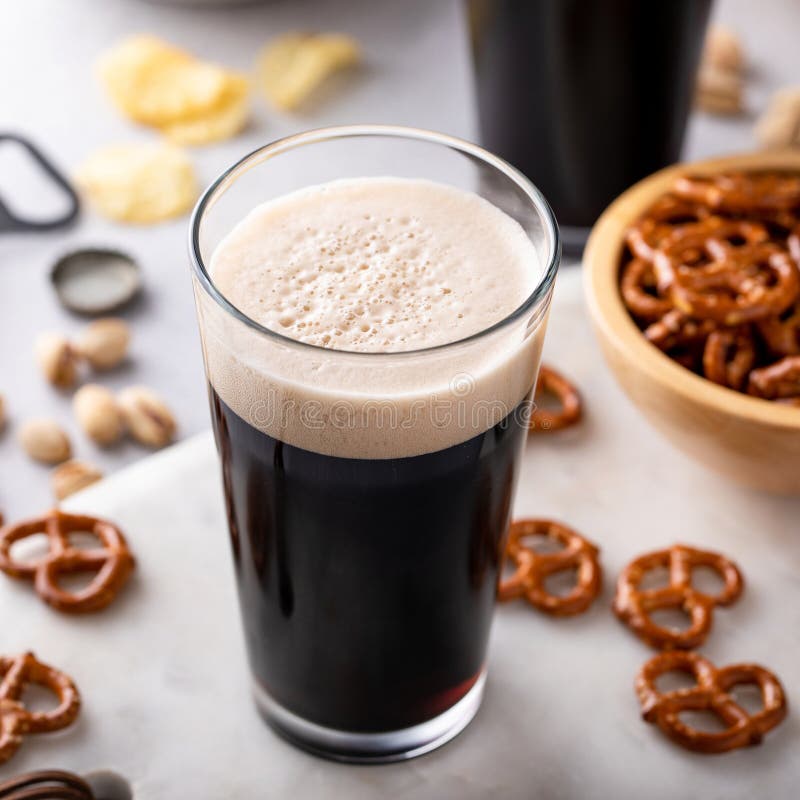 Dark Stout Beer in Tall Glasses on the Table Stock Image - Image of ...