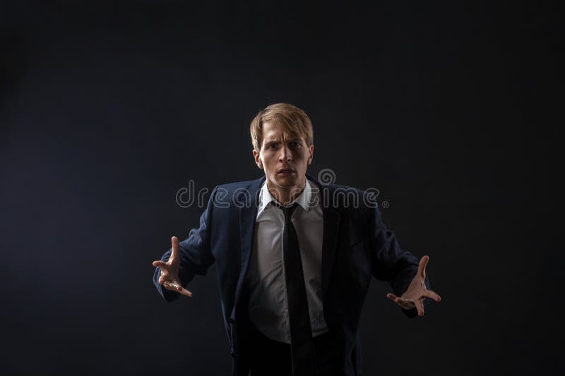 Dark Studio Setting Man Suit Gestures Animatedly Both Hands Stock ...