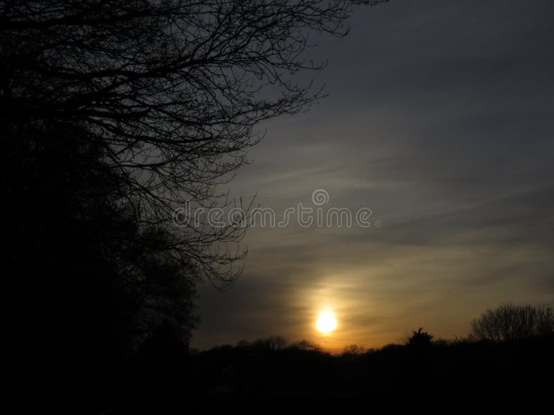 A Dark Sunset in a Dark Evening Sky Stock Image - Image of horizon ...