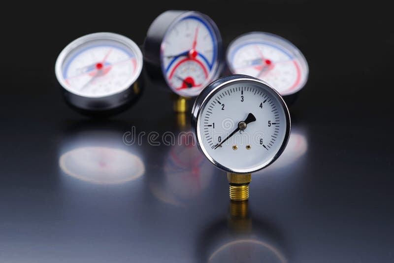Manometer in Focus. a Pressure Gauge on the Background of Other ...
