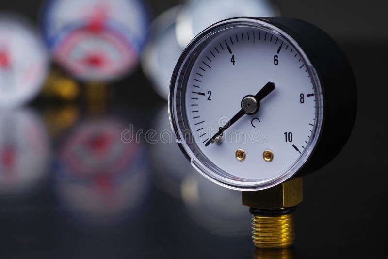 Manometer in Close-up. a Pressure Gauge on the Background of Other ...