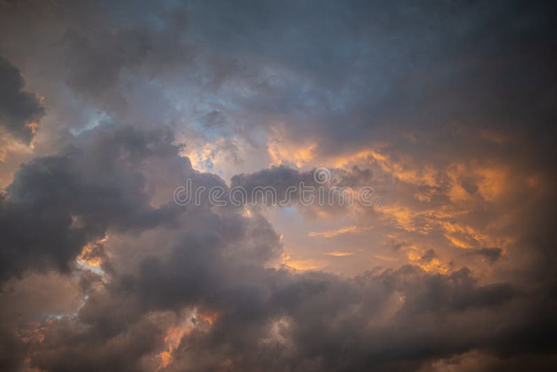 A Dark Thundercloud on the Background of Sunset Stock Photo - Image of ...