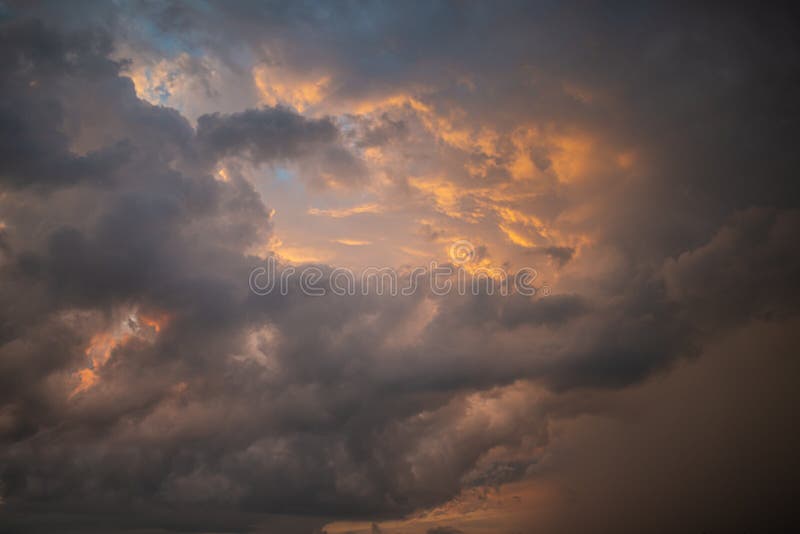 A Dark Thundercloud on the Background of Sunset Stock Image - Image of ...