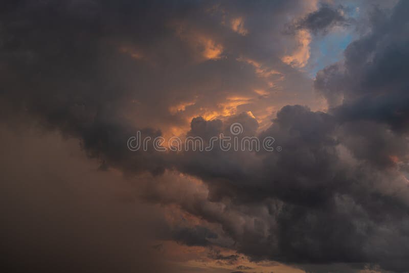 A Dark Thundercloud on the Background of Sunset Stock Image - Image of ...