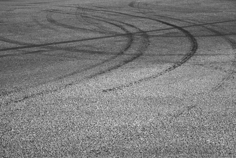 Dark Tire Tracks on Gray Asphalt Road Stock Image - Image of automobile ...