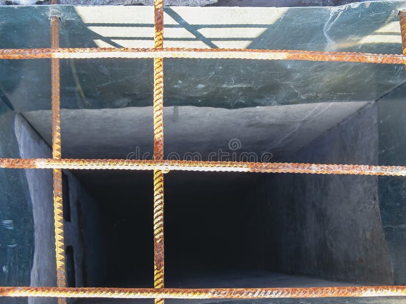 A Dark Tunnel with a Rusty Metal Grate in Front, Creating a Unique ...