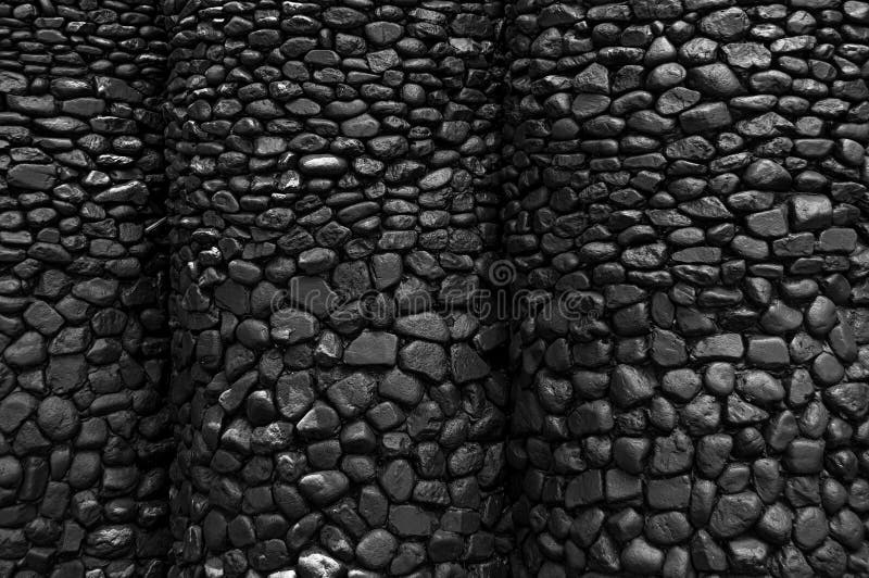 Dark Wall of Sea Pebbles. Construction and Renovation Theme in Curve ...