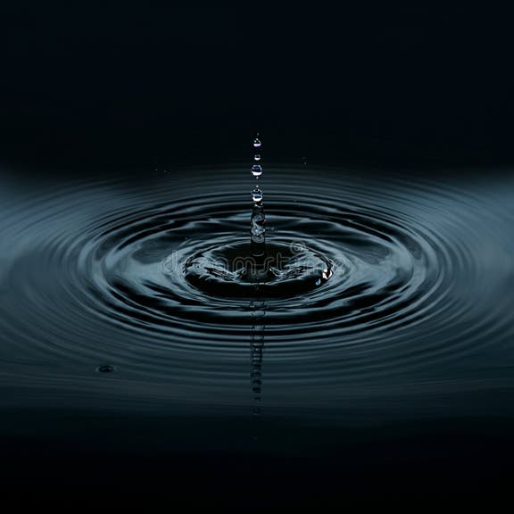 Dark Water Surface with a Single Droplet Causing Ripples. the Centered ...