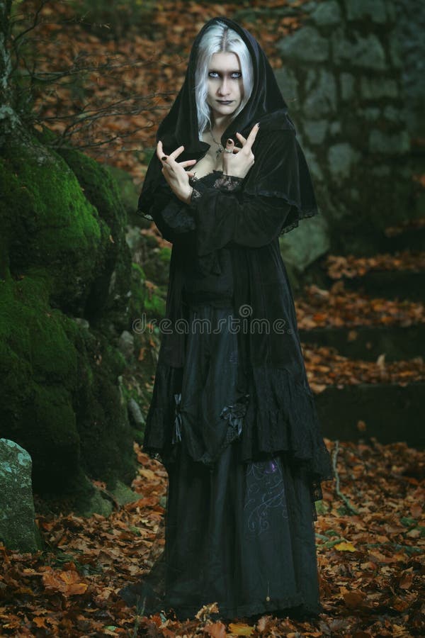 Dark Witch Posing in the Woods Stock Photo - Image of night, dark: 36272314