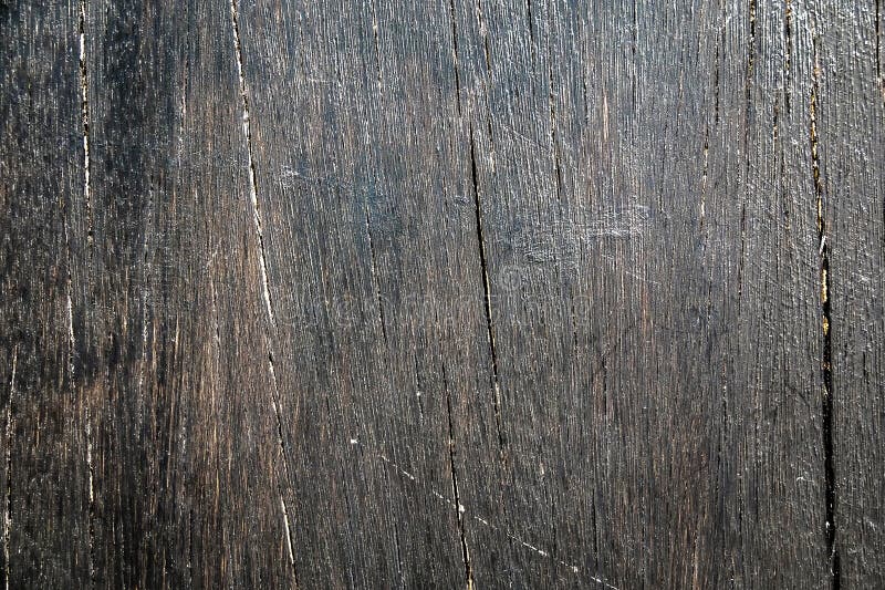 Dark Wooden Surface Featuring Vertical Grain Patterns and Visible ...