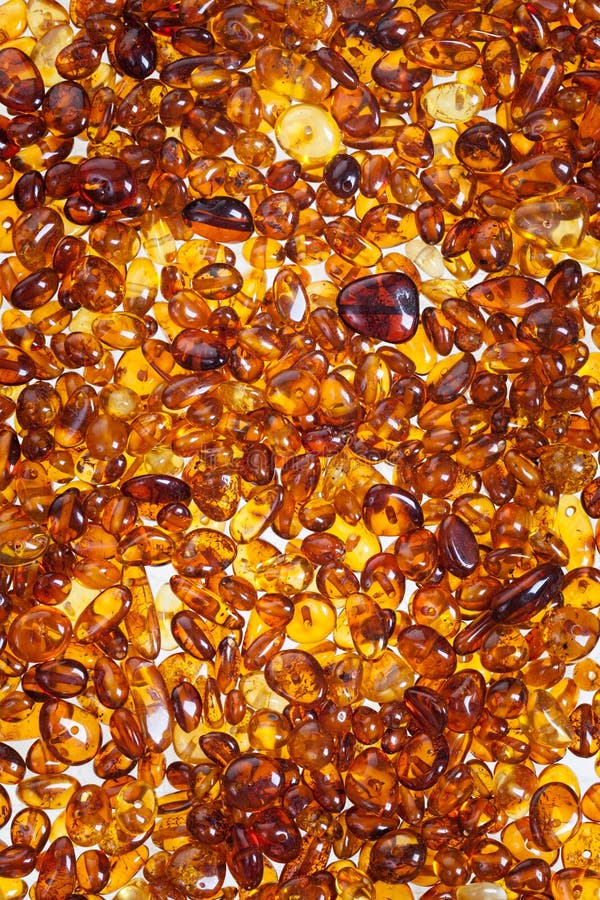 Dark yellow amber stones . stock photo. Image of decoration - 89972472
