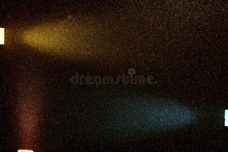 On a Dark Yellow Background in Fine Grain, Rays of Red Yellow and Light ...