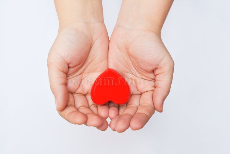 Red heart in hands stock image. Image of donation, give - 50347207