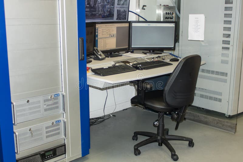 Computerised Electronic Control Workstation Inside a Factory of ...