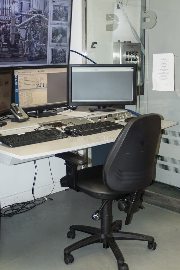 Computerised Electronic Control Workstation Inside a Factory of ...