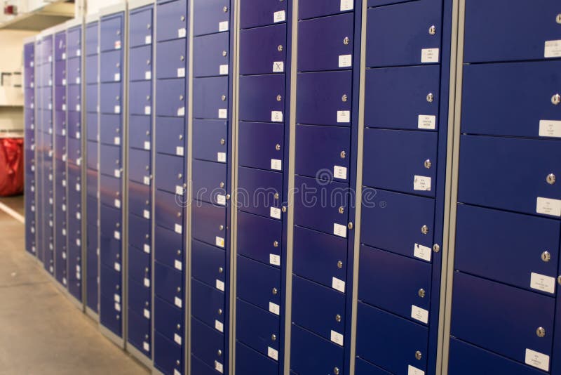 Row of Blue Lockers for Workers or Customers Stock Photo - Image of ...