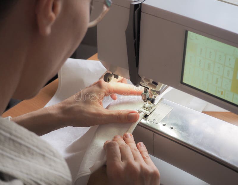 Darning Jeans on a Sewing Machine. Stock Image - Image of machine ...