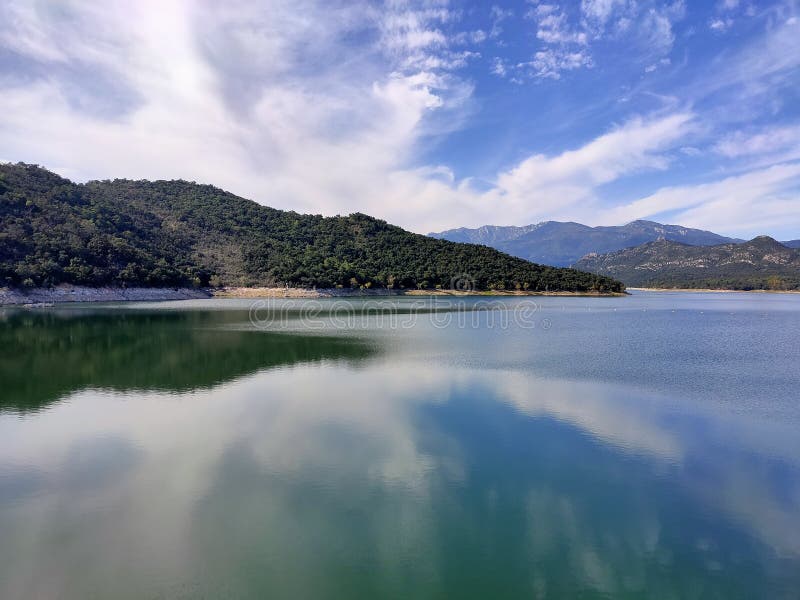 Darnius lake stock photo. Image of cloud, reflection - 200374516