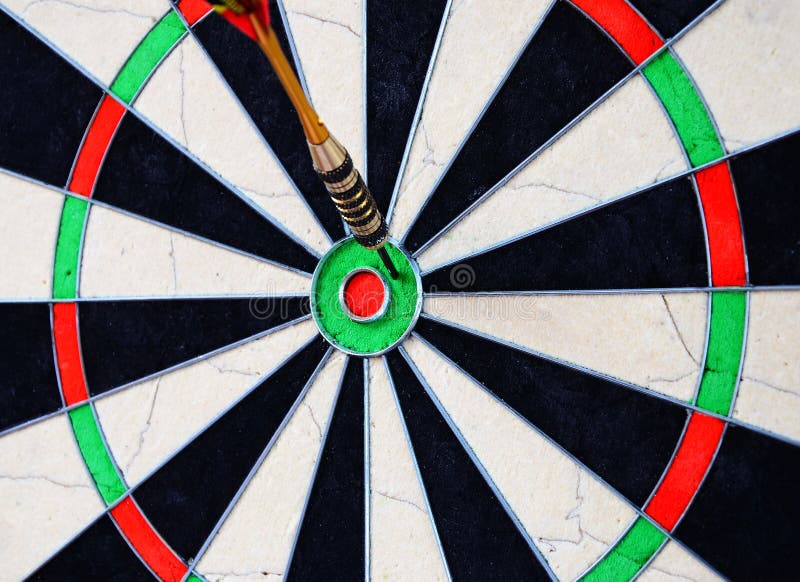 Dart Arrow Hitting in the Target Center of Dartboard. Stock Photo ...