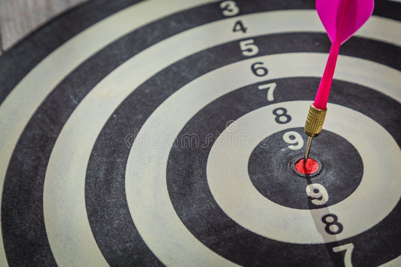 Dartboard with Darts Stuck Right in Center of the Target Stock Image ...
