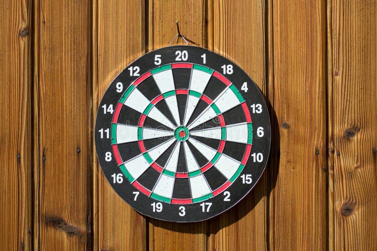 Dartboard on Wood Wall (no Darts) Stock Image - Image of object, circle ...