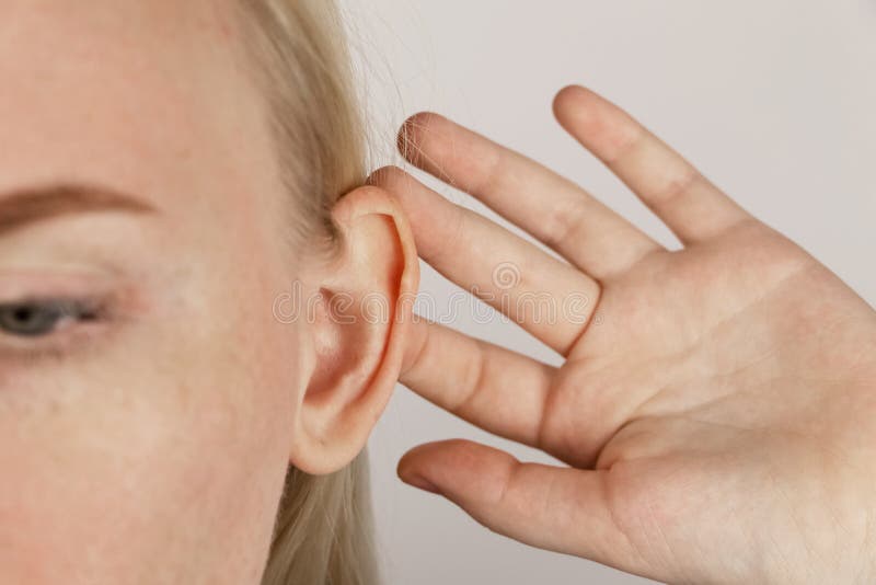 Darwin`s Tubercle on the Ear. the Girl at the Reception at the Plastic ...