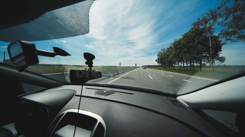 Dashboard Camera Capturing Highway Driving through Windshield Under ...