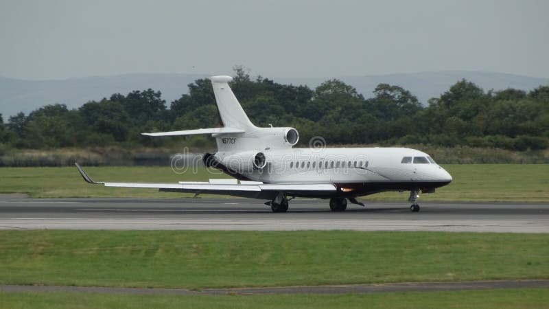 Dassault Falcon 7X stock photo. Image of airfield, private - 58160004