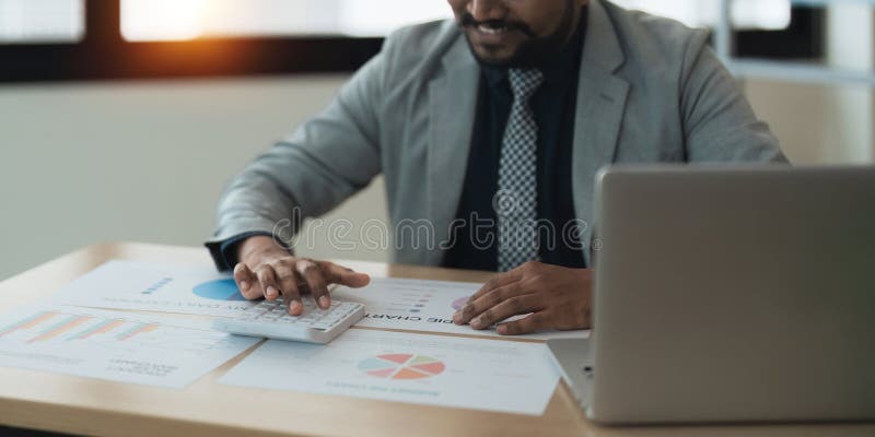 Data Analysis and Business Statistics Concept, Indian Businessman Using ...