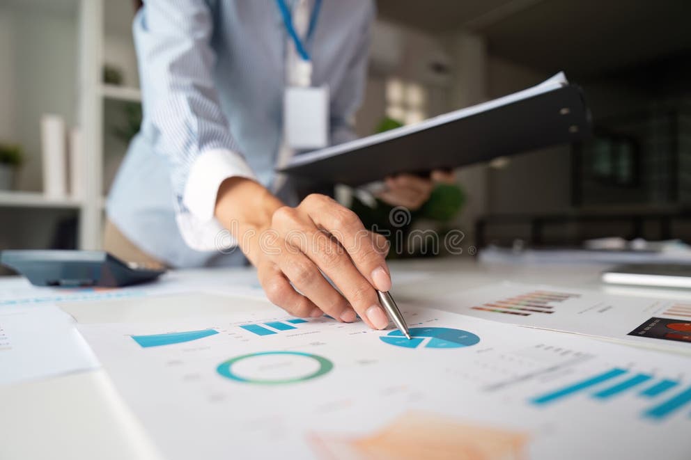 Data Analysis and Presentation. a Professional Analyzing Charts and ...