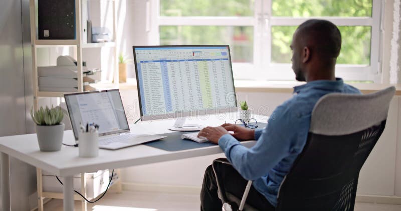 Data Analyst African Man Using Spreadsheet Stock Image - Image of ...