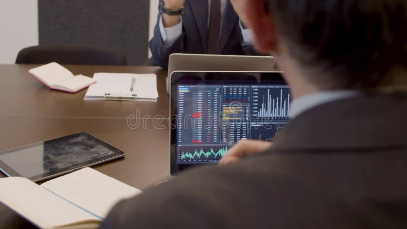 Data Analysts Sitting in Meeting Room and Working Together Stock ...