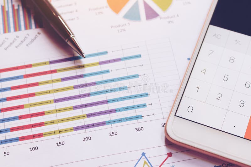 Data Analyzing with Calculator in Smart Phone and Pen on Charts Stock ...