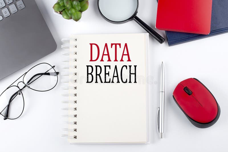 DATA BREACH Text on a Notepad with Laptop on the White Background Stock ...