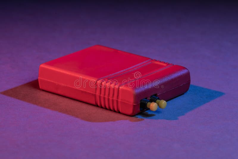 Data Cartridge for a 1980s Computer. Red with Two Yellow Buttons ...