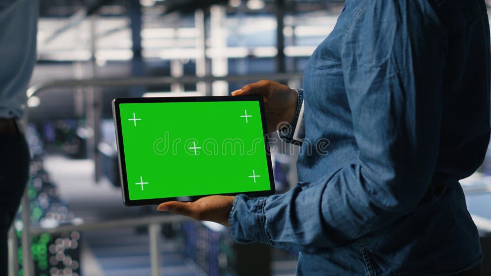 Data Center Admin Checking Code on Tablet Next To Colleague Stock Image ...