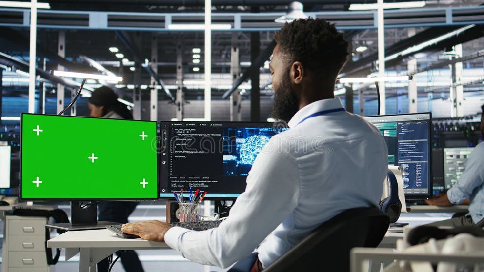 Data Center Admin Using Green Screen PC To Do Node Tree Programming Stock Image - Image of ...