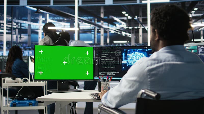 Data Center Admin in Wheelchair Using AI Node Tree Software on Green Screen PC Stock Image ...