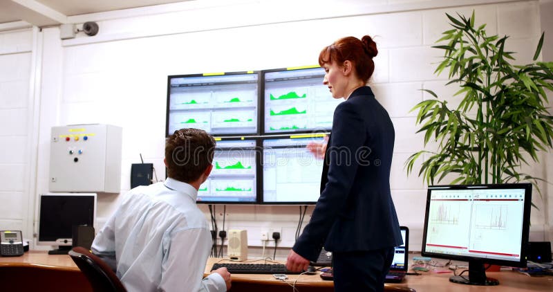 Data Center Staff Member in Office Using AI Deep Learning Algorithms ...