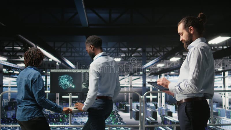 Data Center Computer Scientists Using Devices To Review Ai Llm Visualizations Stock Footage