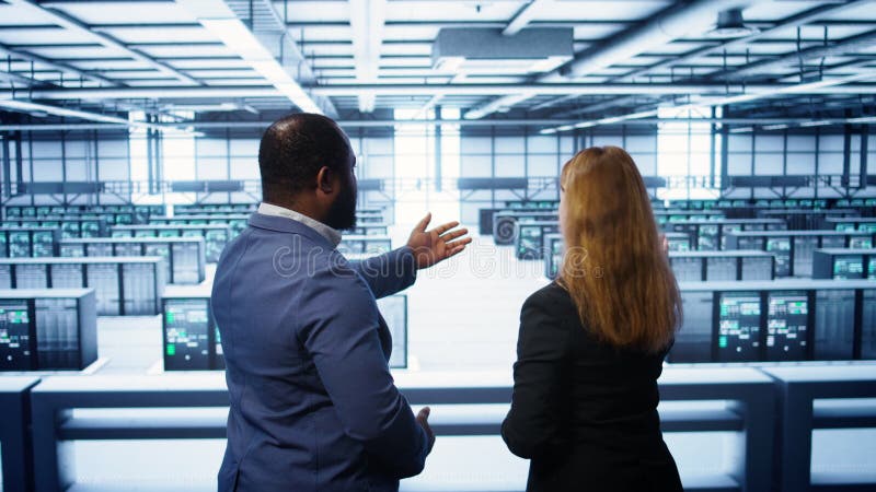 Data Center Engineer Presenting Equipment To Inspector Supervising Operations Stock Image ...